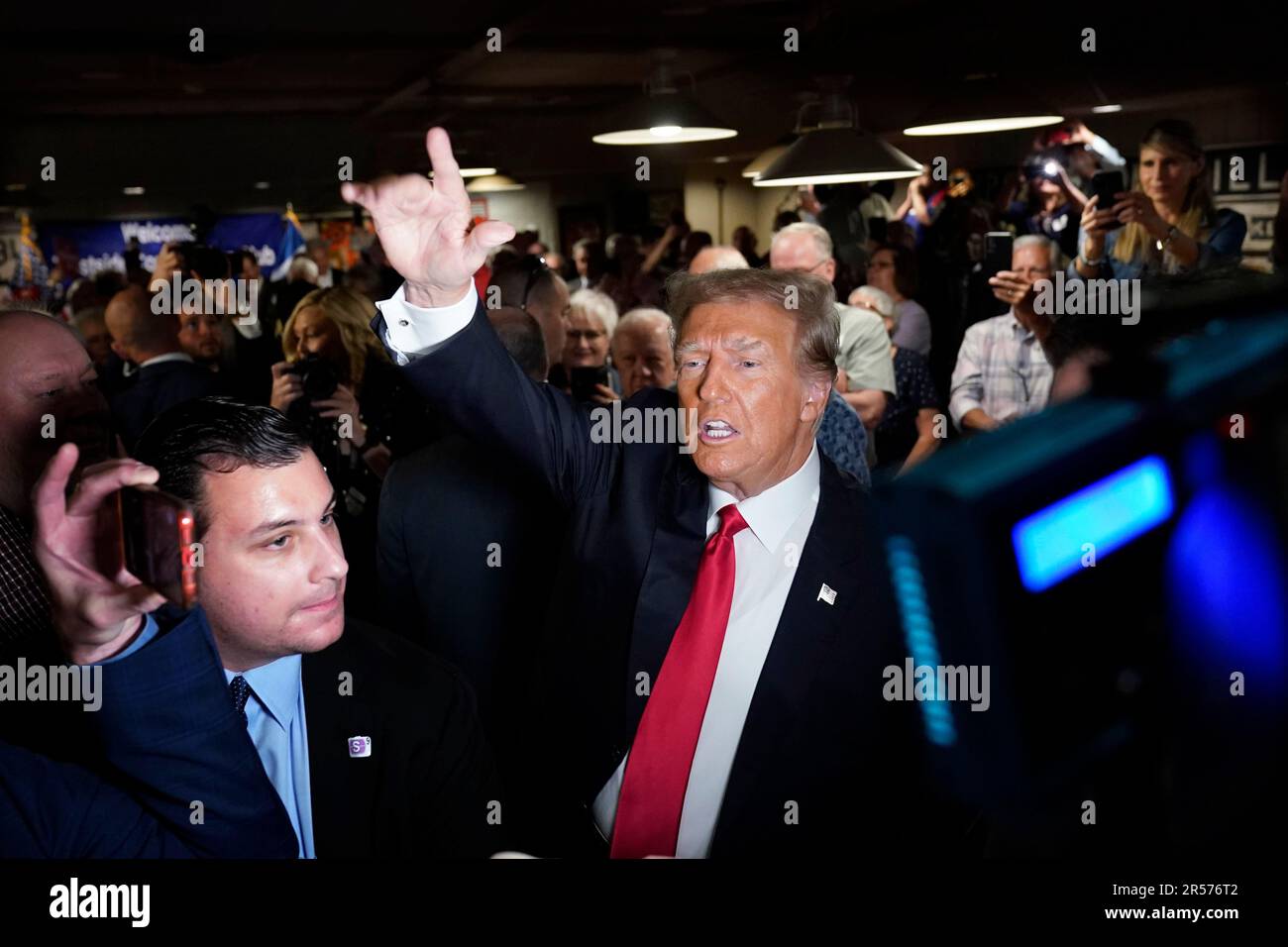 Former President Donald Trump greets supporters before speaking at the ...