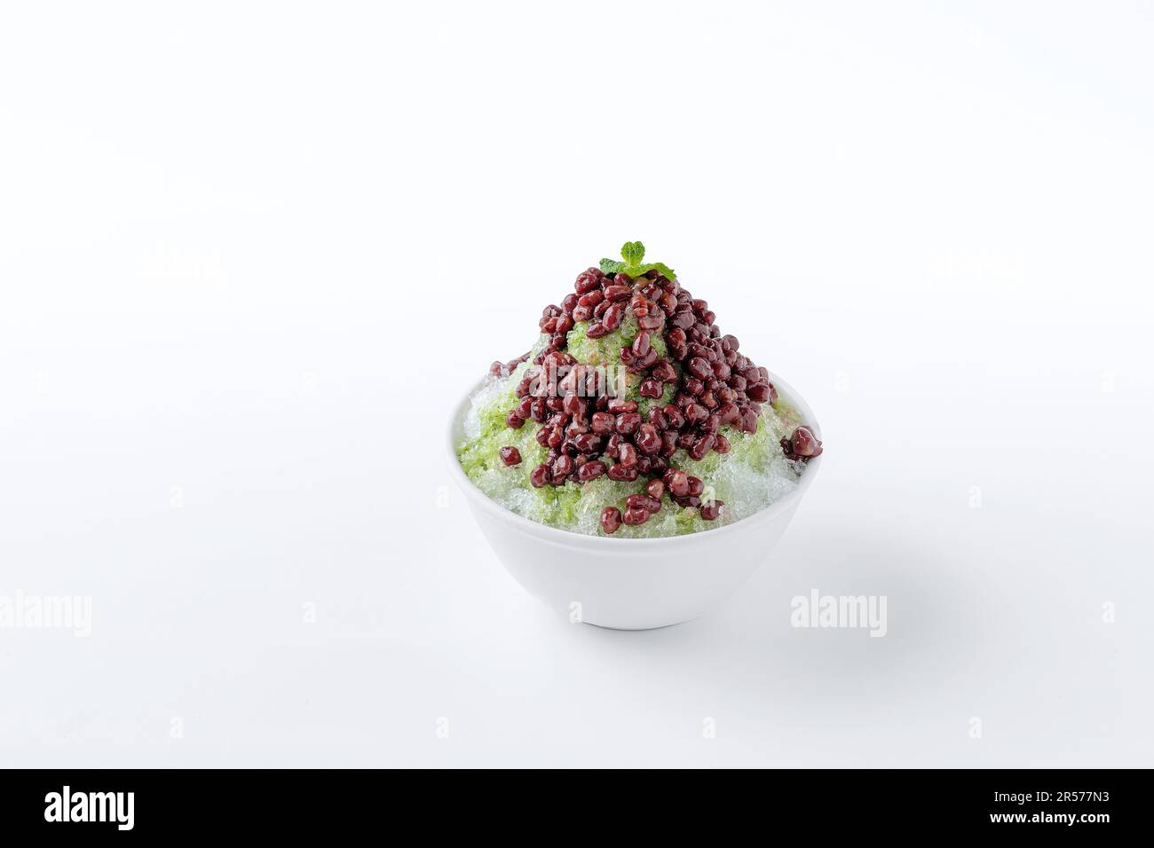 Korean shaved ice dessert with sweet toppings, green beans Bingsu on ...