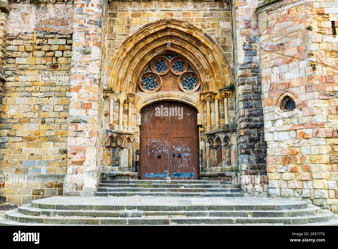 The arched grand entrance of the Church of Santa Maria de la Asuncion ...