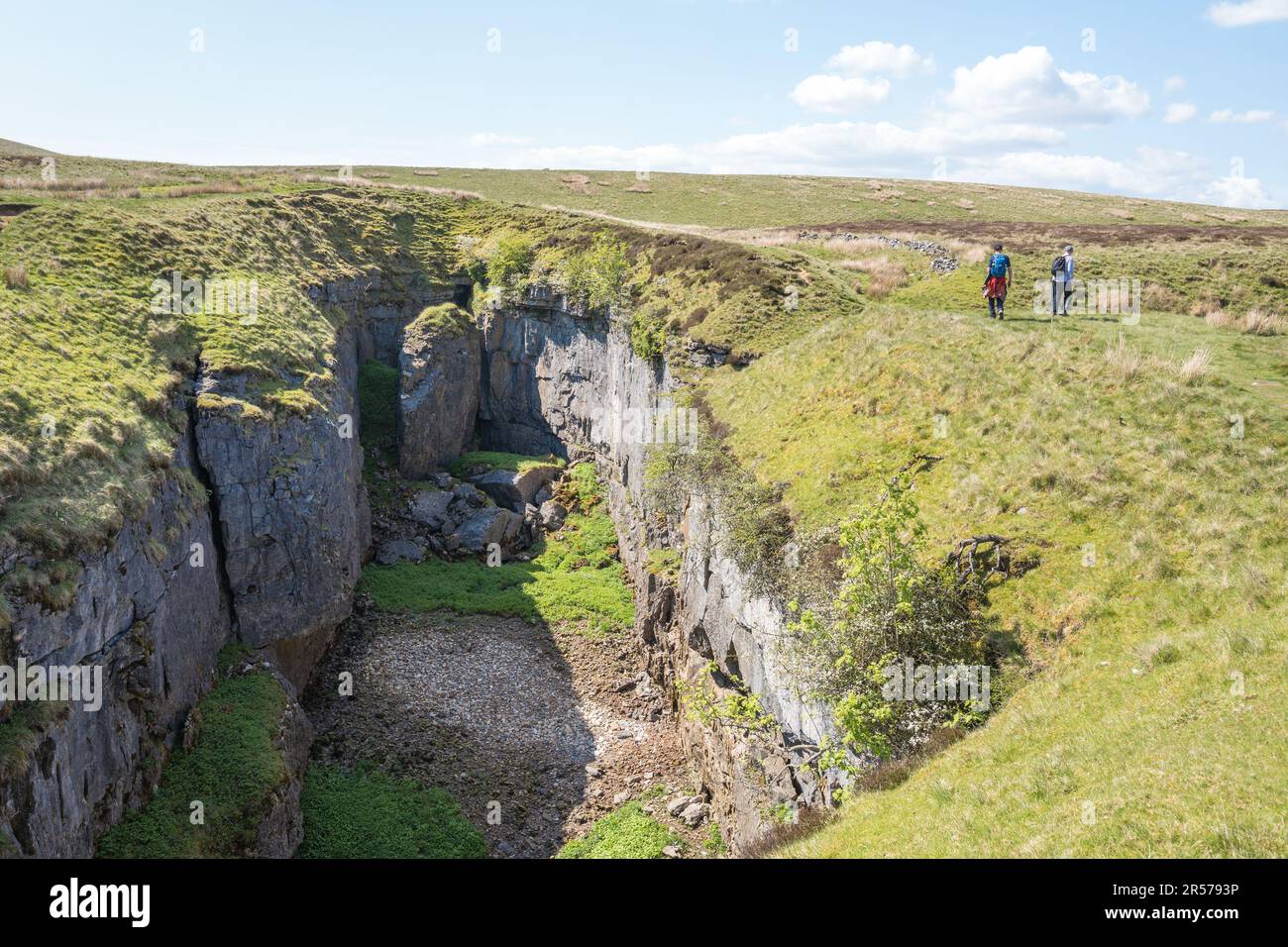 Hull Pot, a collapsed cavern fed by the Hull Pot beck, Pen-y-Ghent ...