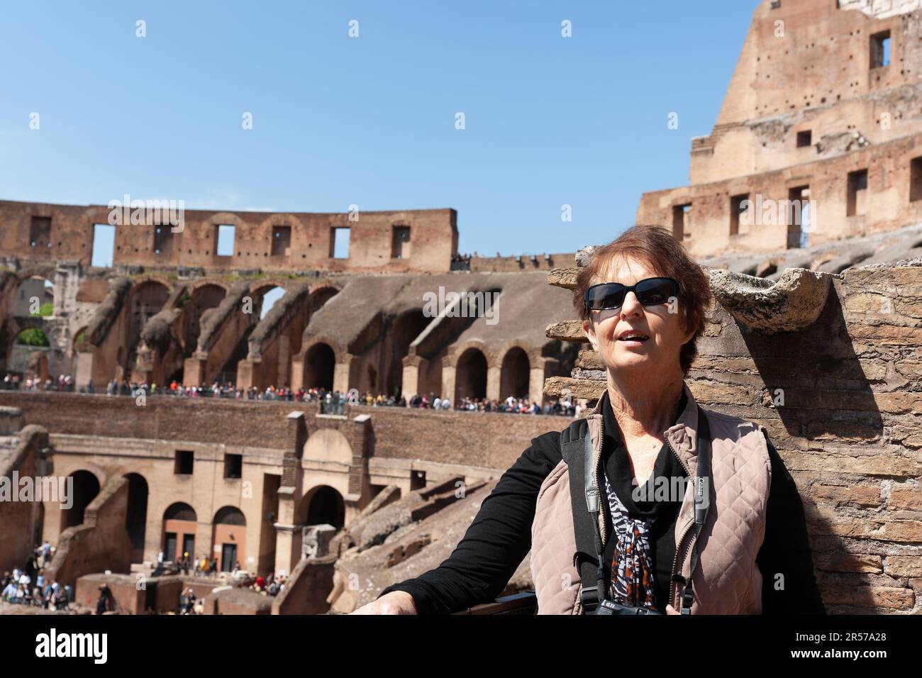 Rome April 16 2011; Tourist looking in awe at Colosseum famous and ...