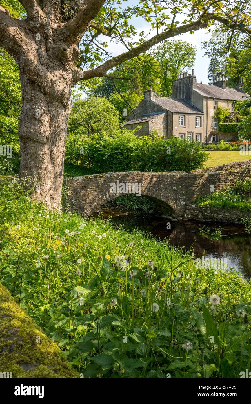 The small country Yorkshire village Clapham with historic stone built ...