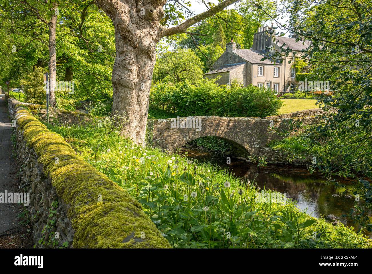 The small country Yorkshire village Clapham with historic stone built ...
