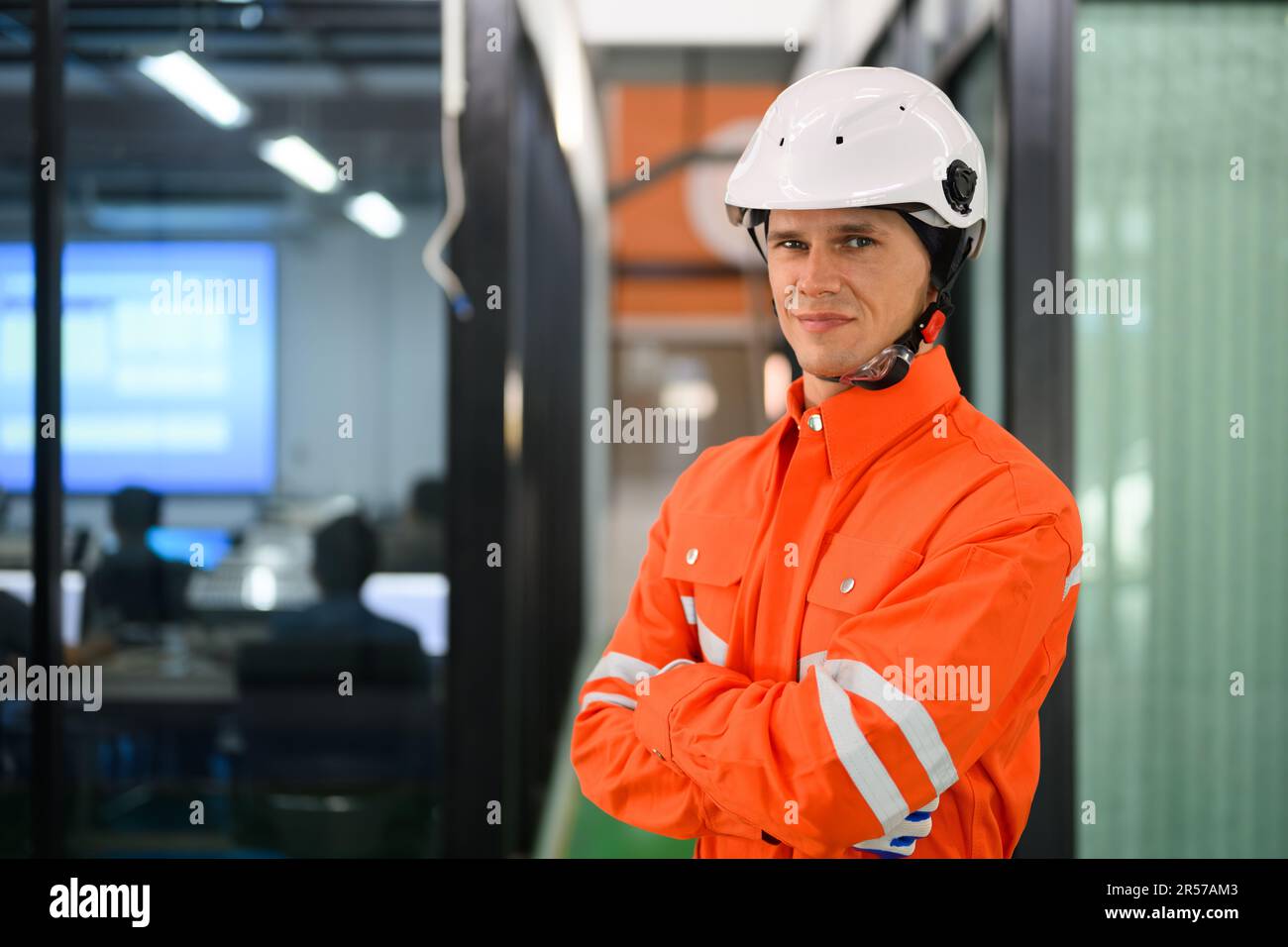 Engineer working and solving problems on machine at industrial plant ...