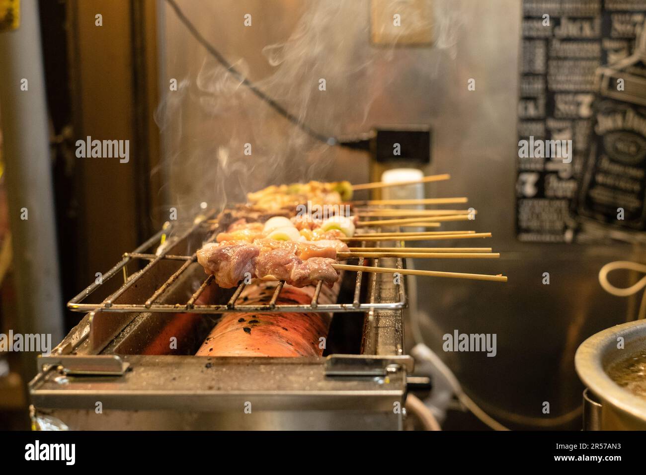 Yakitori being cooked on a grill, Omoide Yokocho, Shinjuku, Tokyo ...