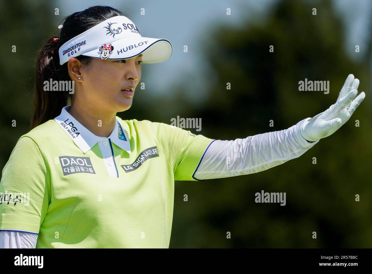 Jin Young Ko, of South Korea, lines up her shot on the tenth fairway during the first round of ...