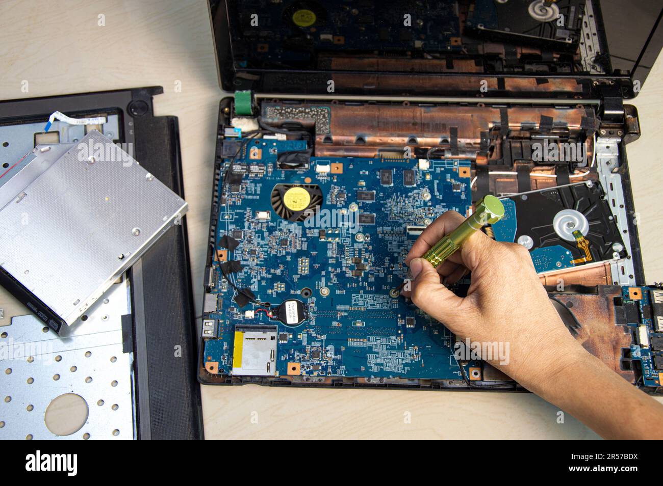 top view mechanic repairing computer notebook, harddisk, cpu Stock ...