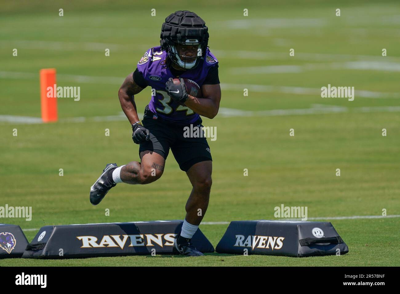 Baltimore Ravens running back Keaton Mitchell works out during the team ...