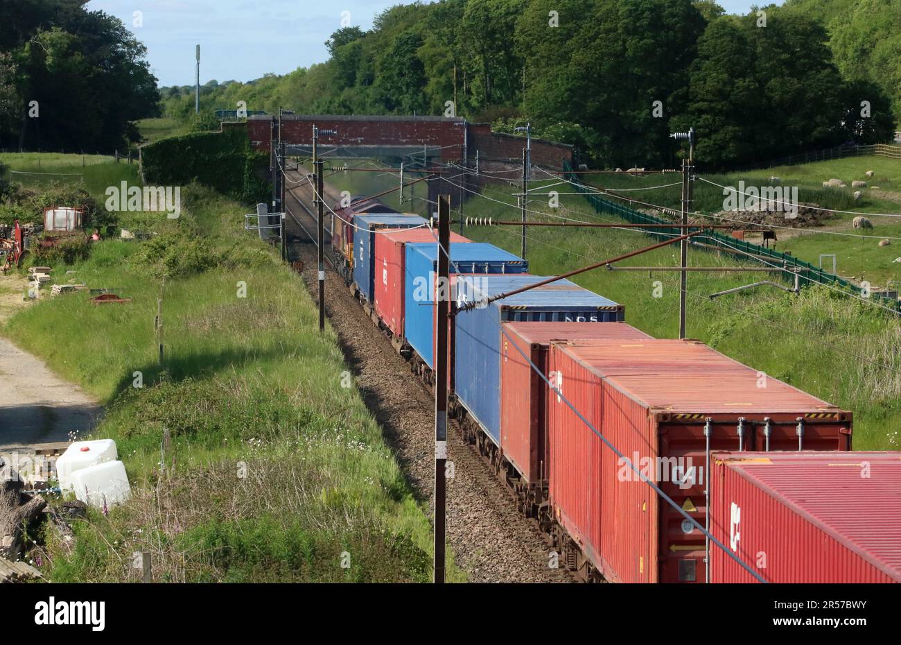 Class 66 diesel-electric shed locomotive on container train on West ...
