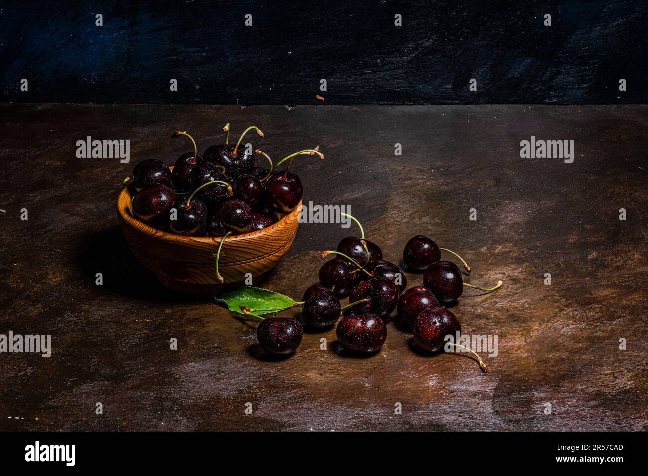 Hand-turned wooden bowl, with cherry picks freshly picked from the tree ...