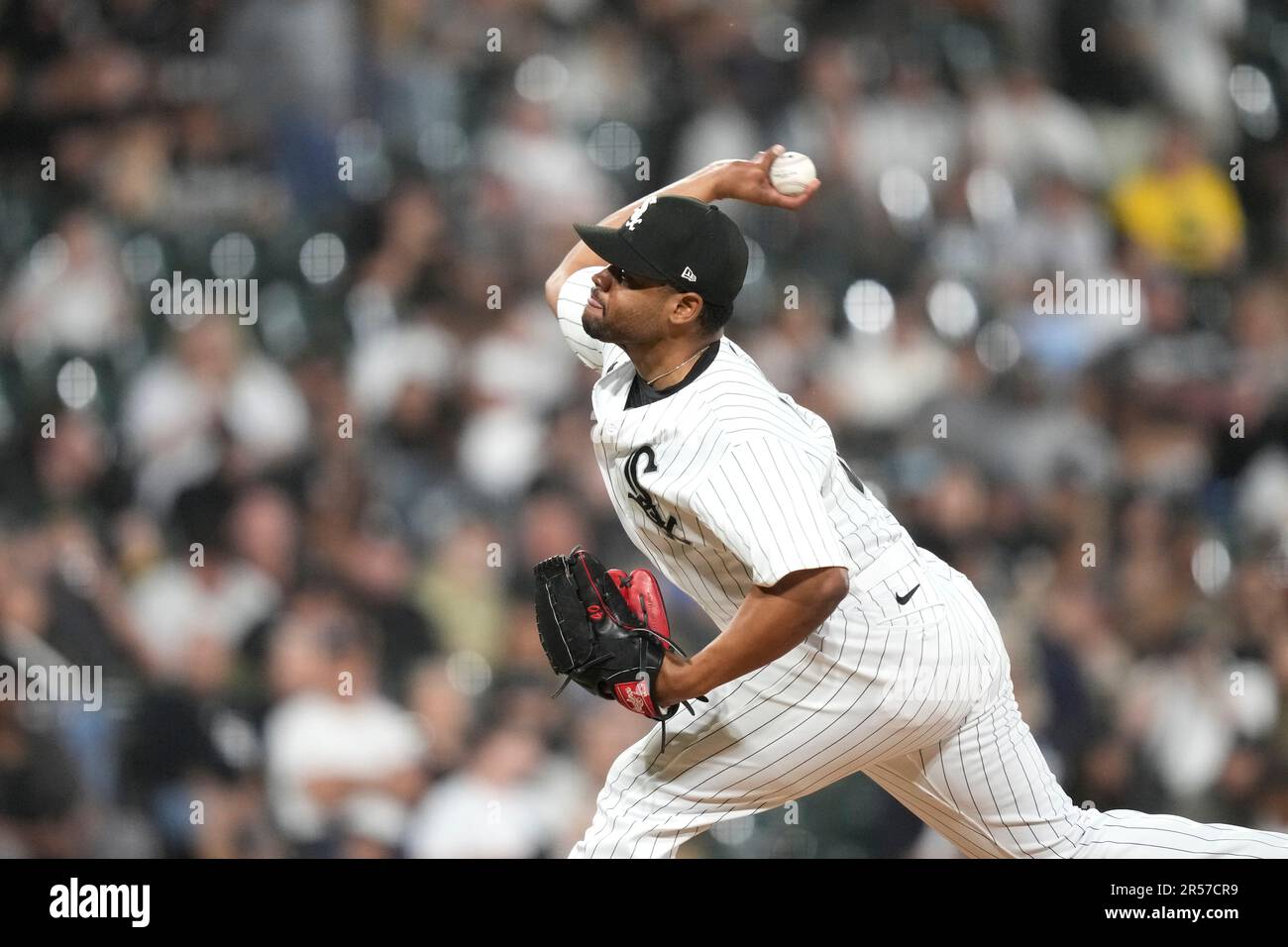 Chicago White Sox relief pitcher Reynaldo Lopez delivers in a baseball ...