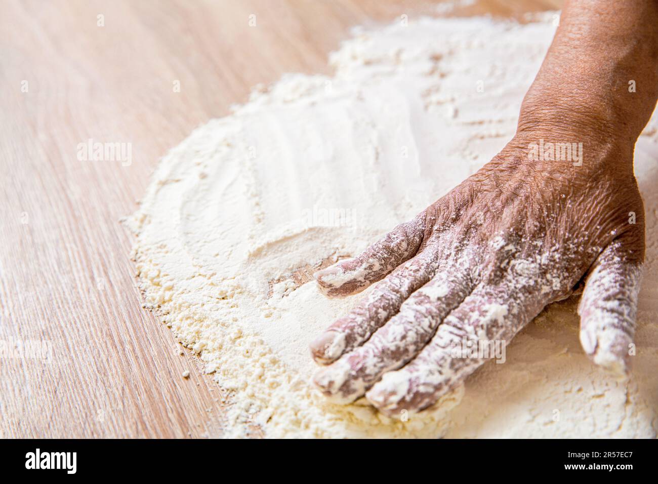 Hand flour. Hands baker with flour in kitchen. Hands woman covered in ...