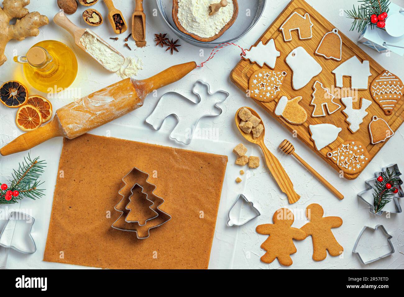 Christmas gingerbread different shaped with sugar icing and ingredients ...