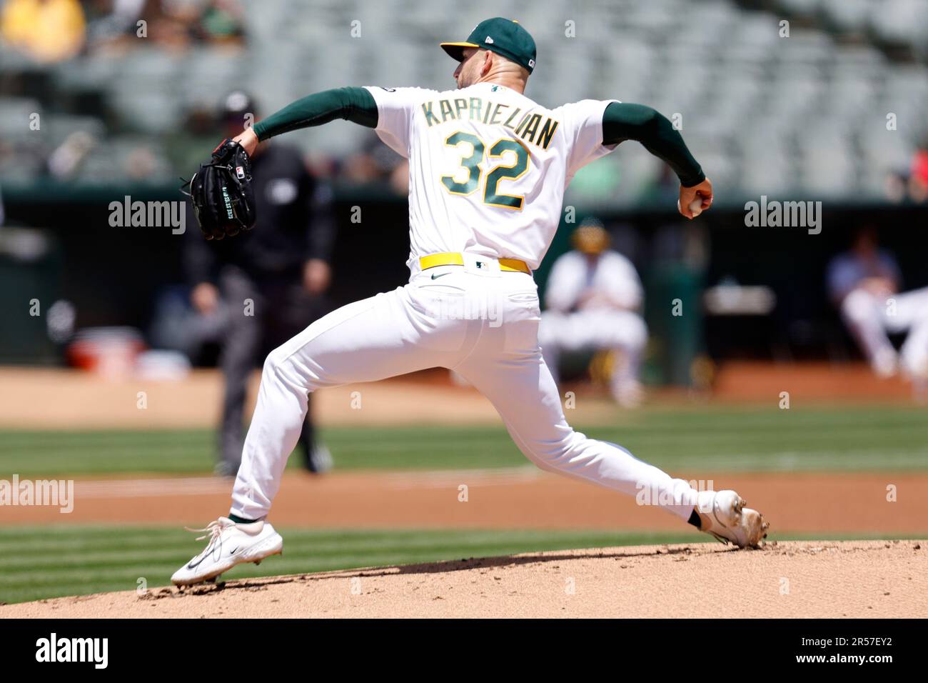 Oakland Athletics pitcher James Kaprielian (32) throws against the ...