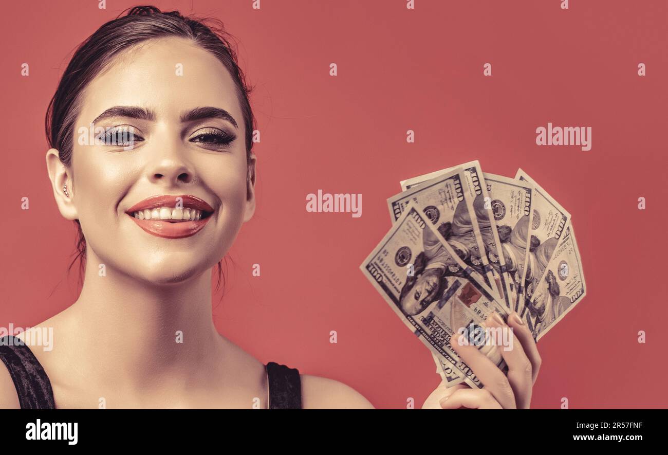 Luxury, beauty and money concept. Woman with dollars in hand. Girl ...