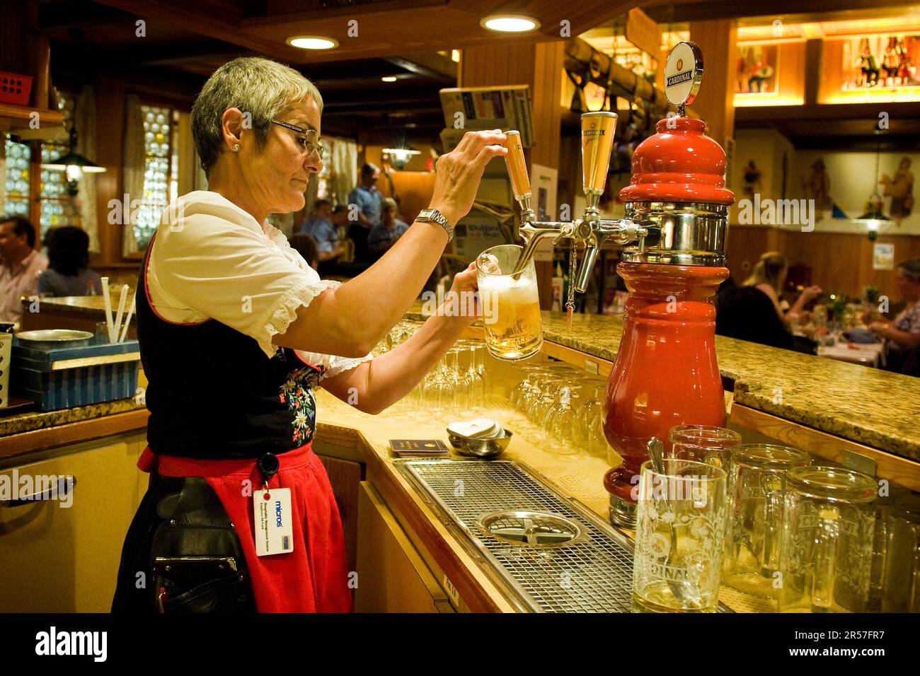 Switzerland. Canton Valais. Zermatt. Pulling a pint of beer Stock Photo ...