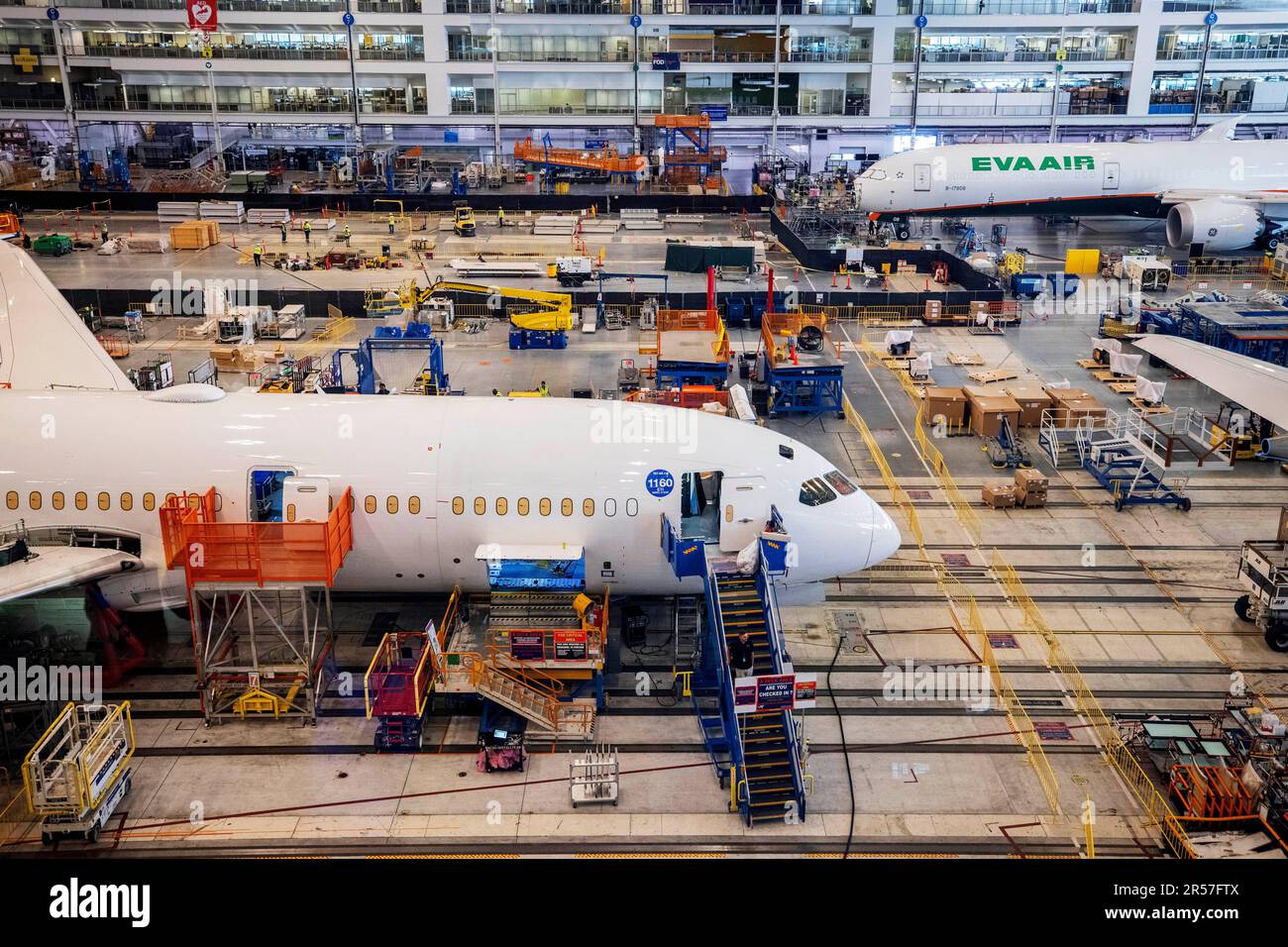 Boeing employees assemble 787s inside their main assembly building on ...