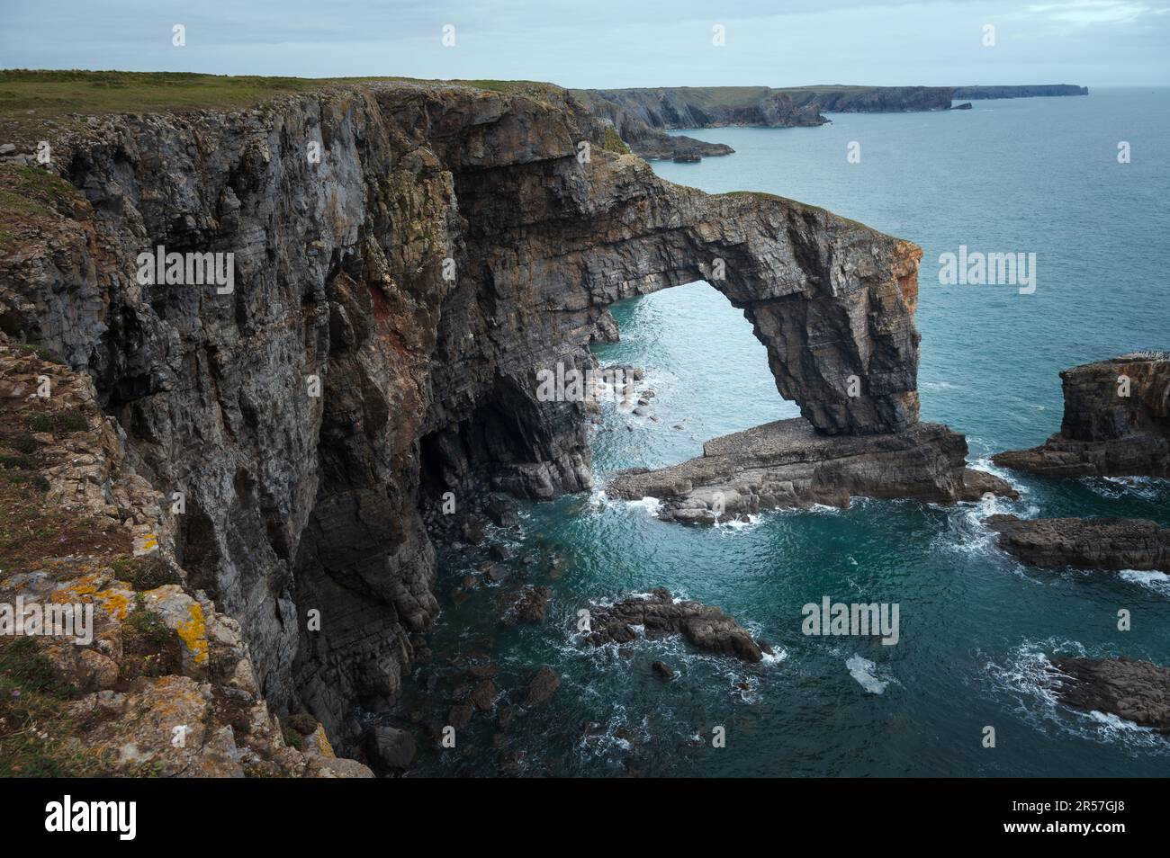 The Green Bridge cliff formation on the Pembrokeshire coast Stock Photo ...