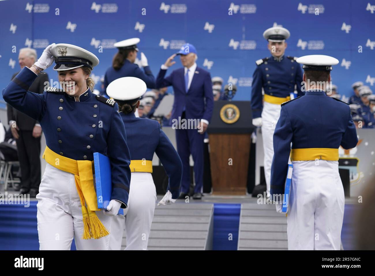 Cadets celebrate after receiving their diploma from President Joe Biden during the 2023 United ...