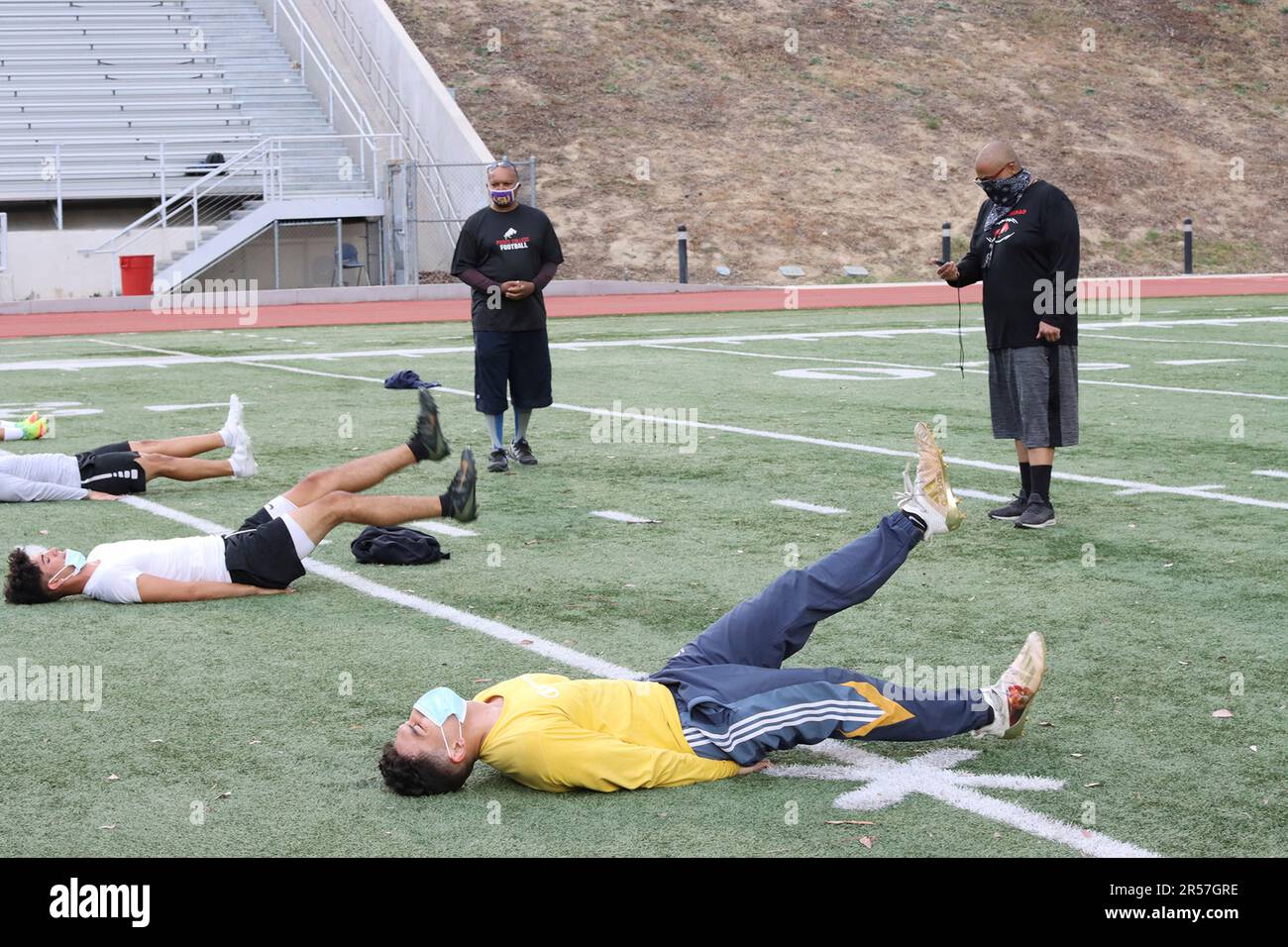 Coaches direct students' workouts at Shepard Stadium at Pierce College ...