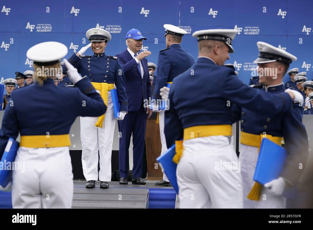 Cadets celebrate after receiving their diploma from President Joe Biden during the 2023 United ...