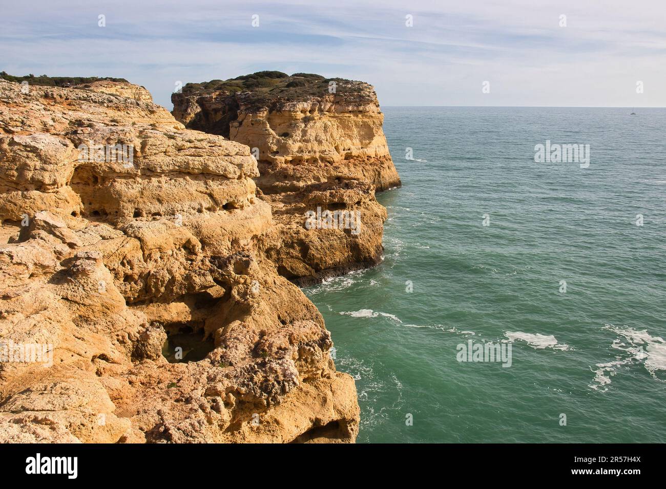 Limestone rock cliffs in the Atlantic Ocean on a sunny winter day in ...