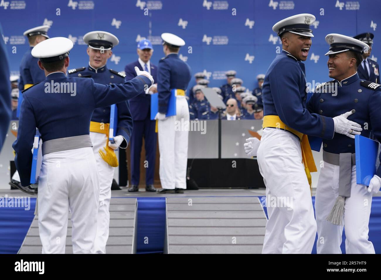 Cadets celebrate after receiving their diploma from President Joe Biden during the 2023 United ...