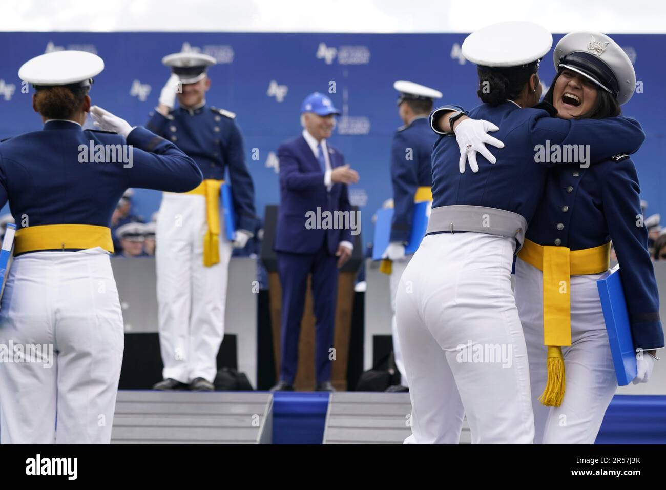 Cadets celebrate after receiving their diploma from President Joe Biden during the 2023 United ...