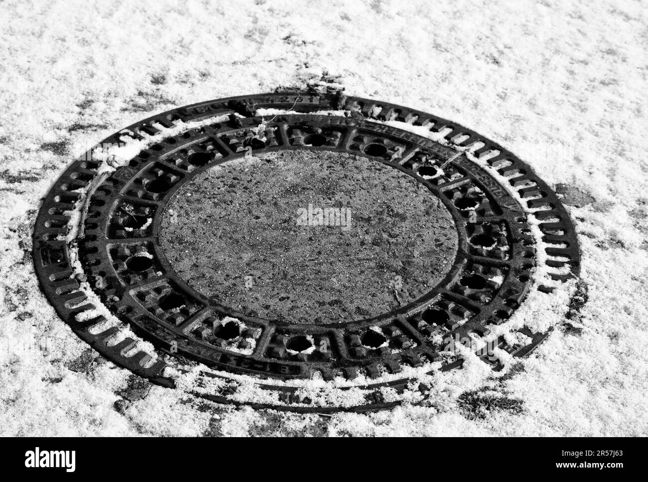 Water manhole cover Black and White Stock Photos & Images - Alamy