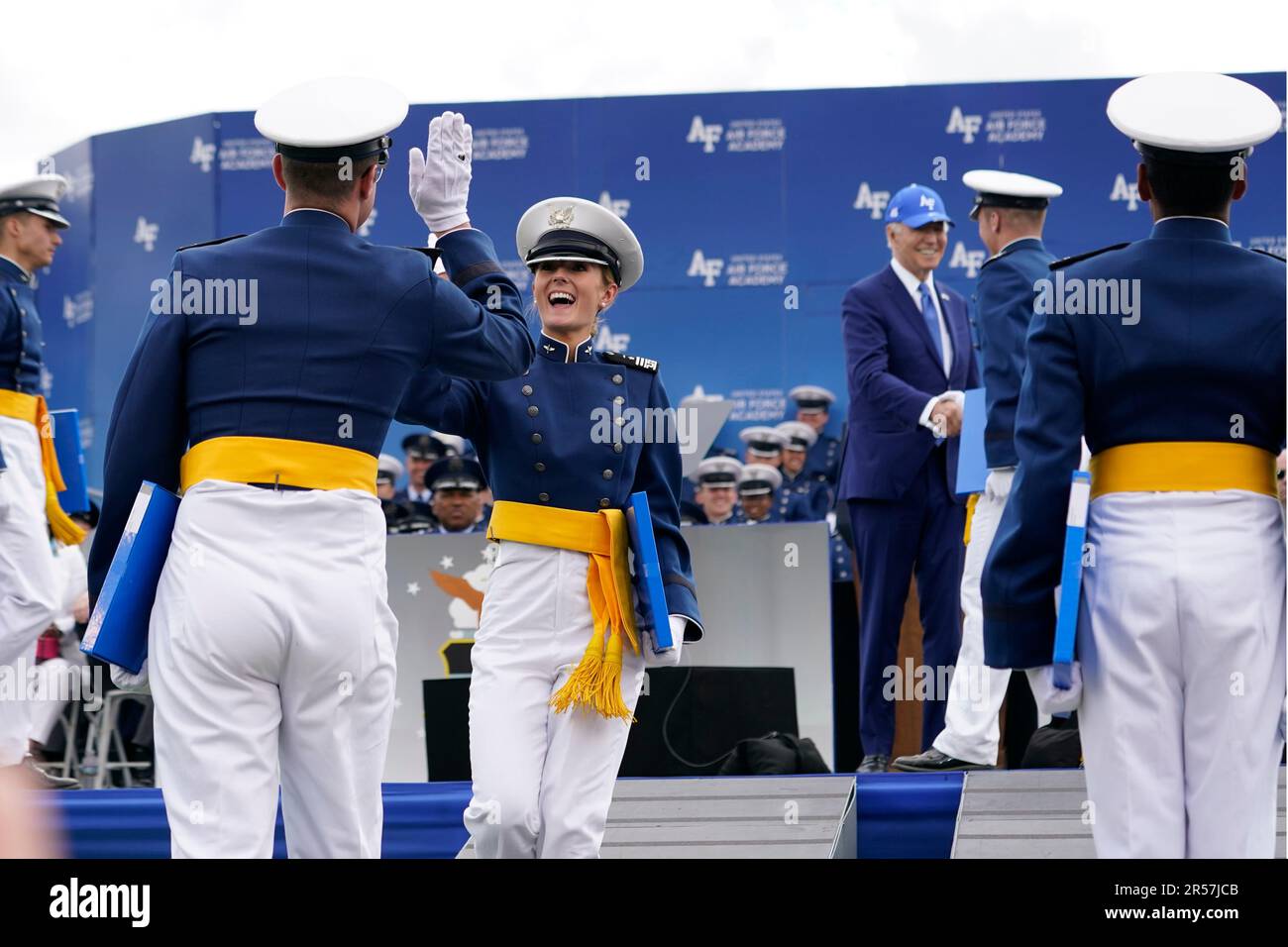 Cadets celebrate after receiving their diploma from President Joe Biden during the 2023 United ...