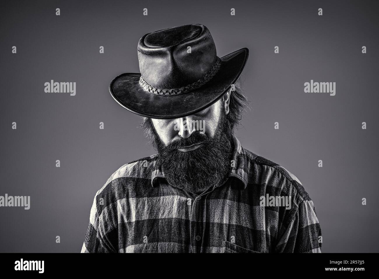 Portrait man wearing cowboy hat. Cowboys in hat. Handsome bearded macho ...