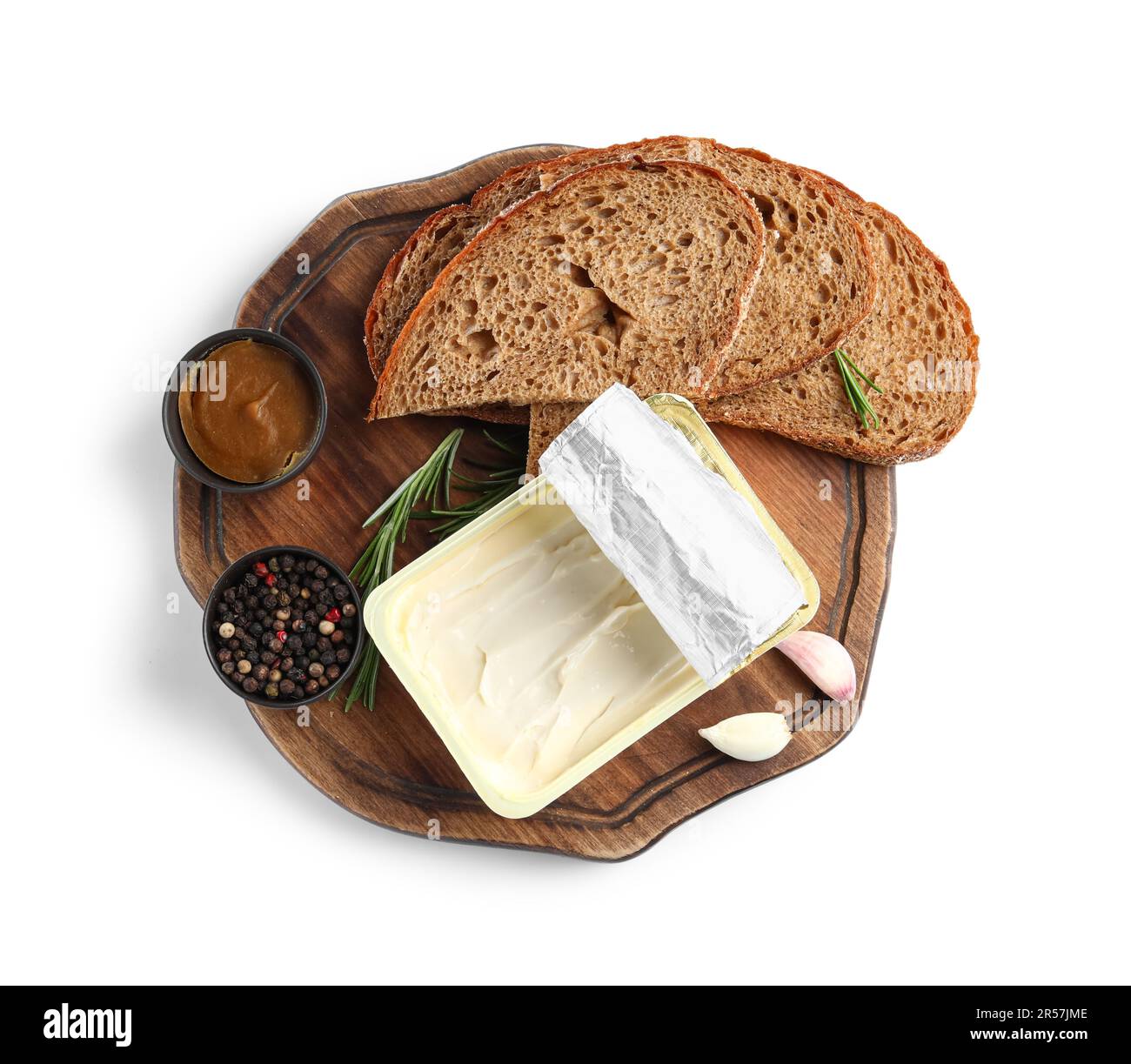Wooden board with box of processed cheese, bread and garlic isolated on ...