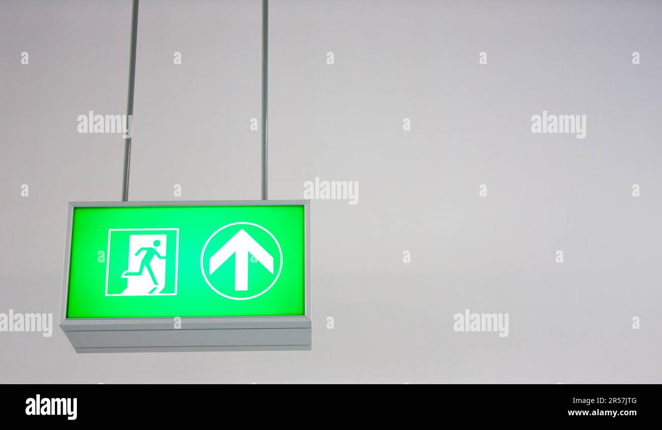 Emergency exit sign in modern offices inside an industrial plant Stock ...
