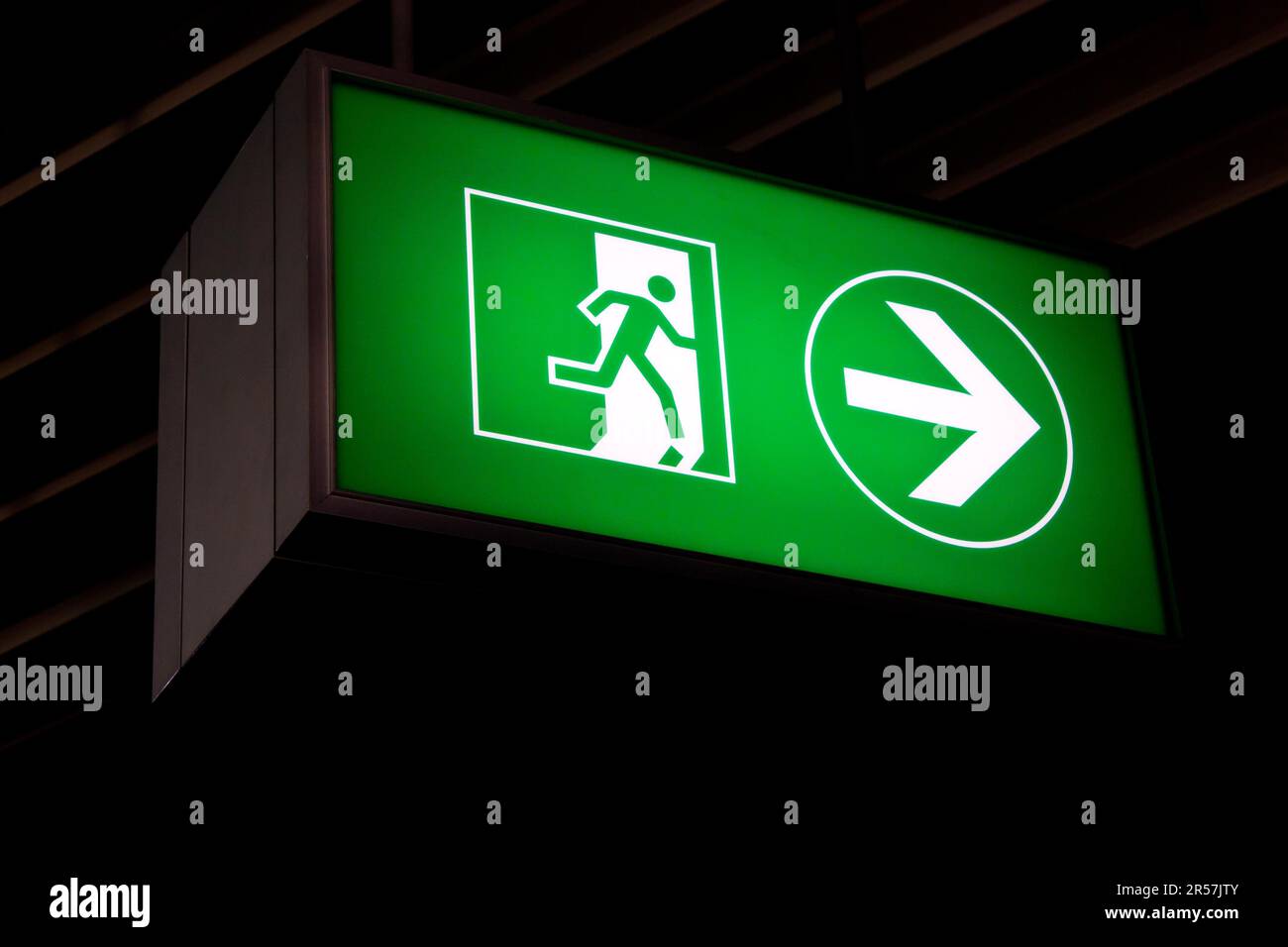 Emergency exit sign in modern offices inside an industrial plant Stock ...