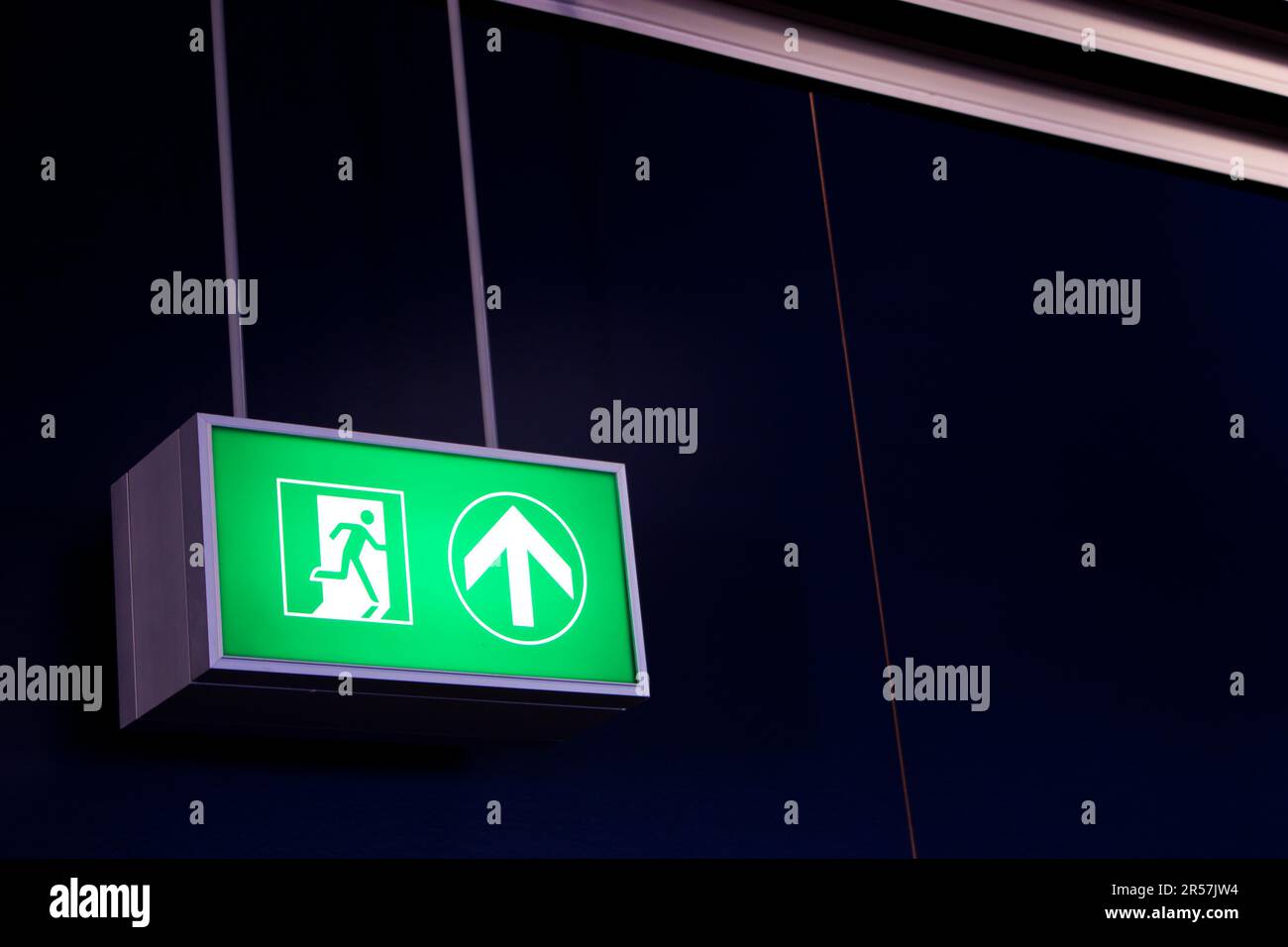 Emergency exit sign in modern offices inside an industrial plant Stock ...