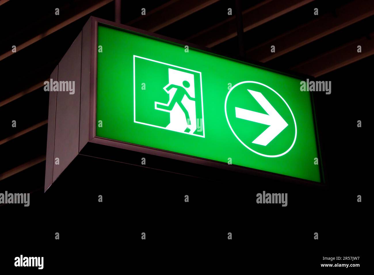 Emergency exit sign in modern offices inside an industrial plant Stock ...