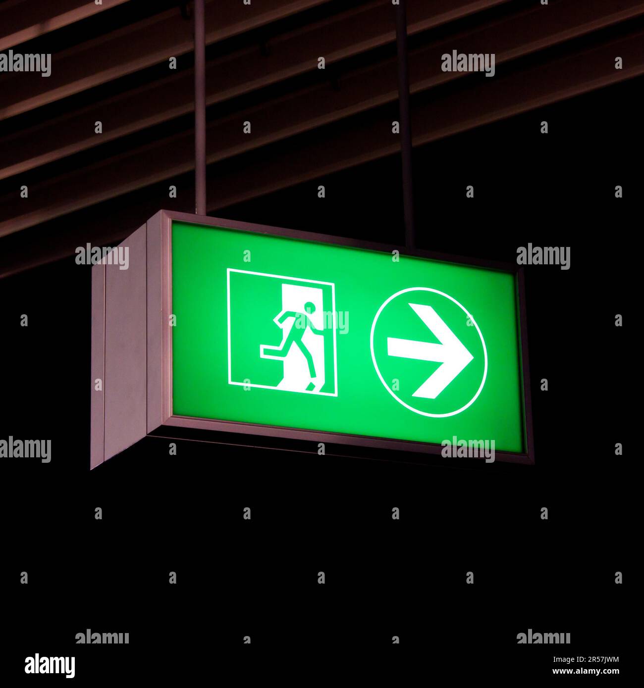 Emergency exit sign in modern offices inside an industrial plant Stock ...