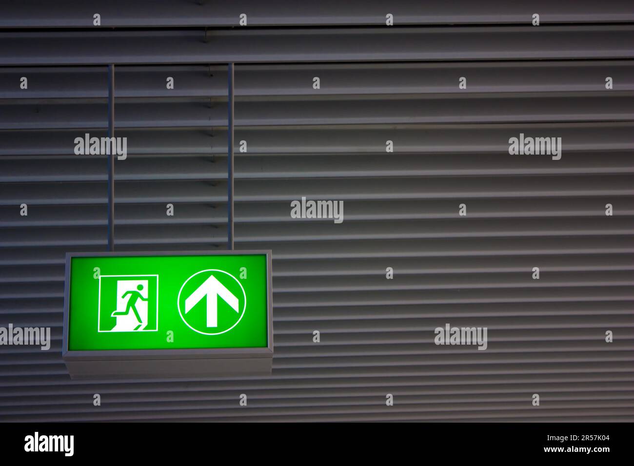 Emergency exit sign in modern offices inside an industrial plant Stock ...