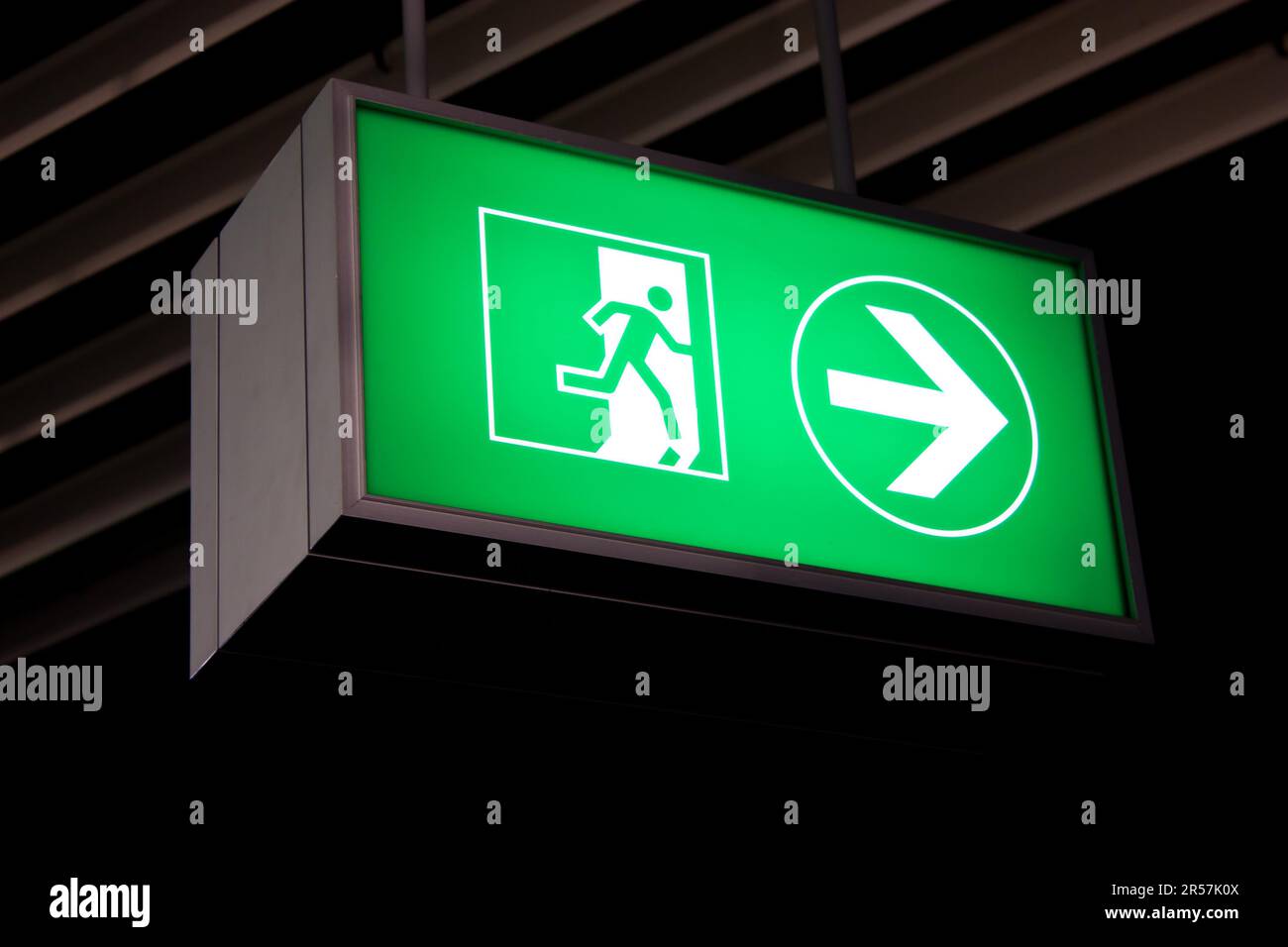 Emergency exit sign in modern offices inside an industrial plant Stock ...