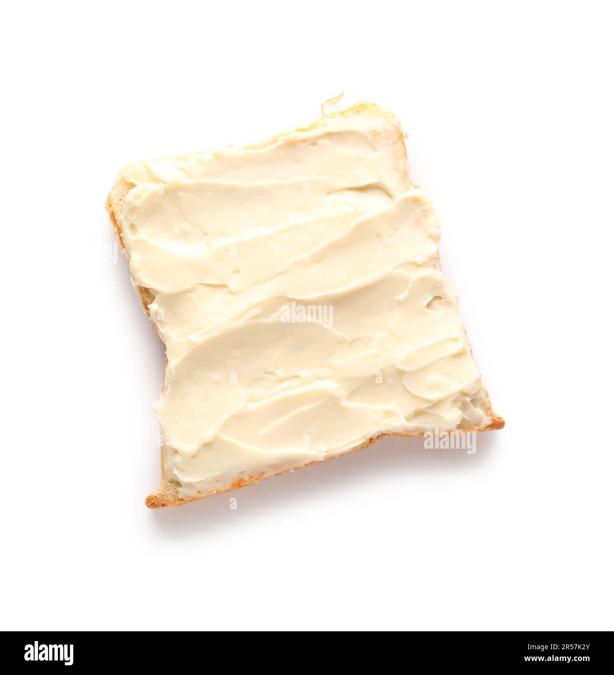 Tasty toast with cream cheese on white background Stock Photo - Alamy