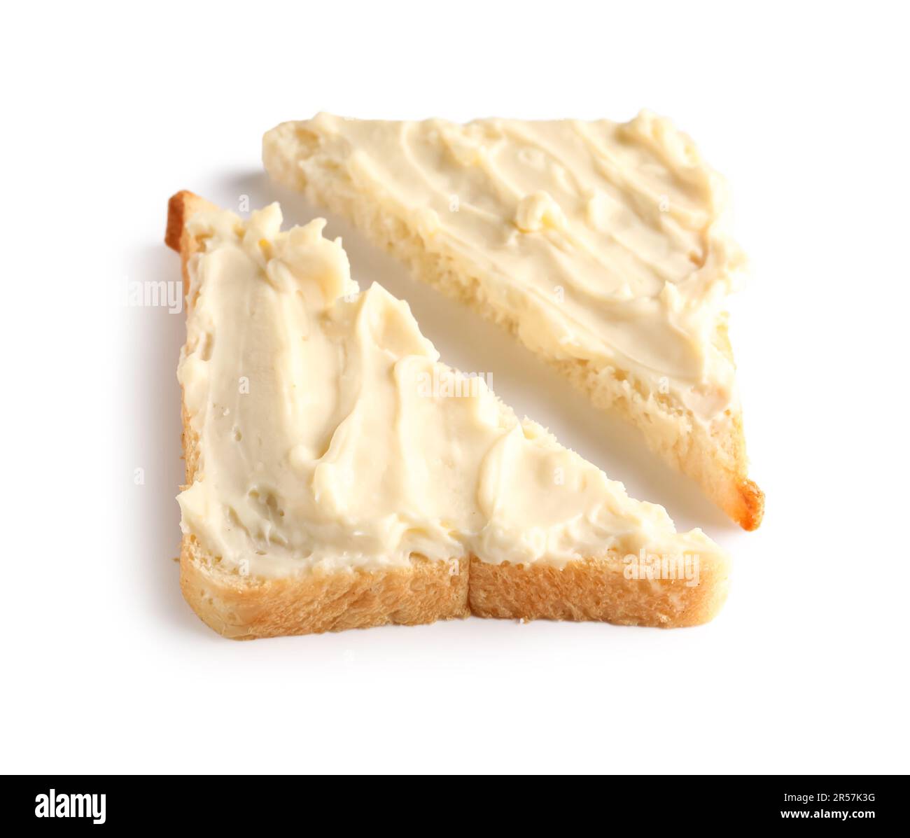 Tasty toasts with cream cheese on white background Stock Photo - Alamy