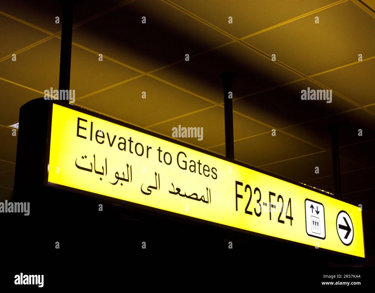 Gate sign in an international airport in Middle East with Arabic ...