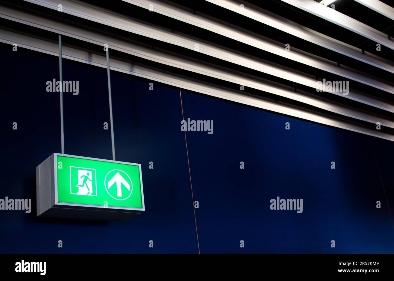 Emergency exit sign in modern offices inside an industrial plant Stock ...