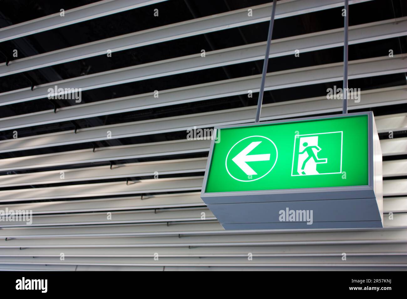 Emergency exit sign in modern offices inside an industrial plant Stock ...