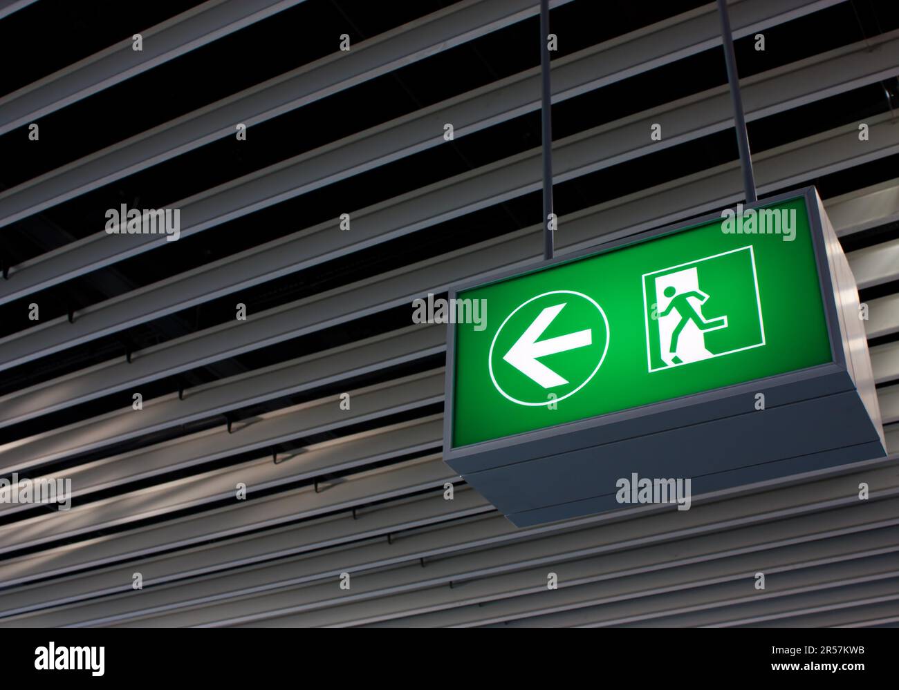 Emergency exit sign in modern offices inside an industrial plant Stock ...