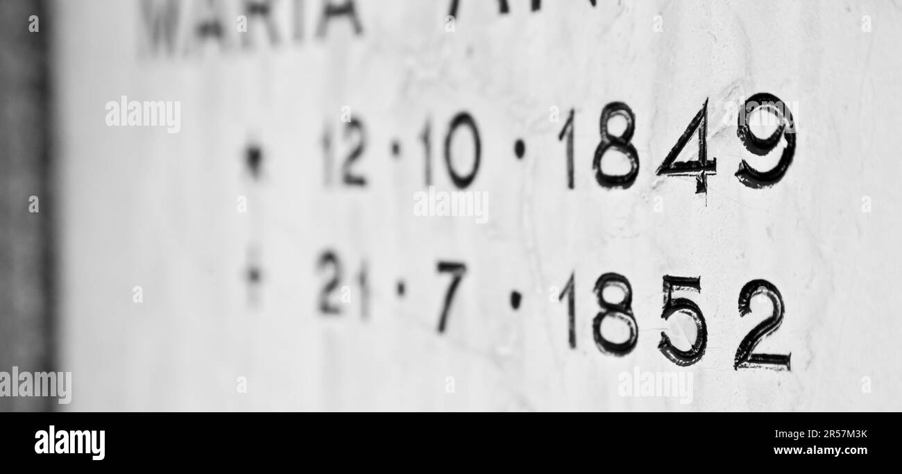Old tombstone in Italian cemetery with birth and death dates Stock ...