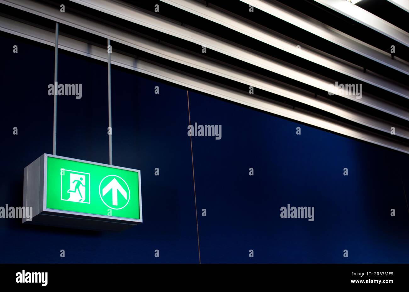 Emergency exit sign in modern offices inside an industrial plant Stock ...