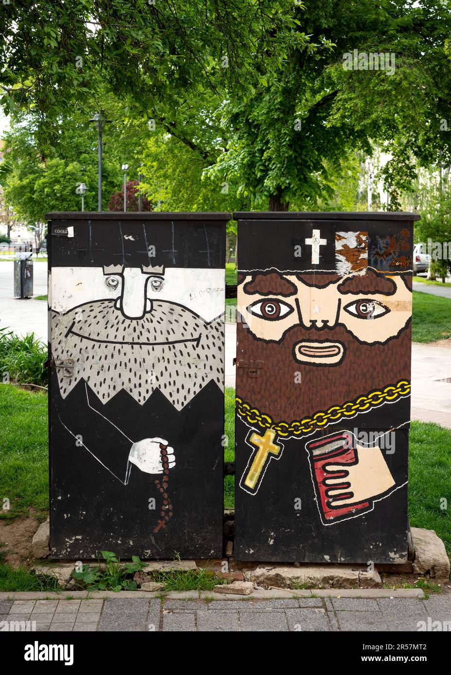 Orthodox Christian priests graffiti street art painting on street ...
