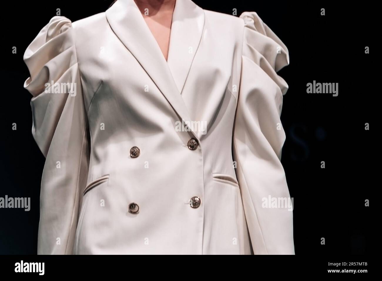 Classy white jacket with buttons on female body. Fashion fancy details ...