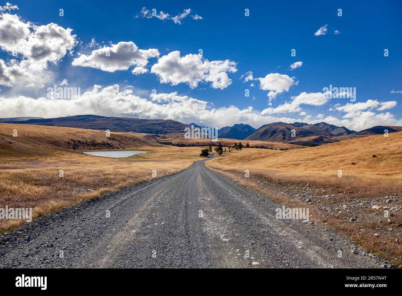 Road alongside mountain hi-res stock photography and images - Alamy